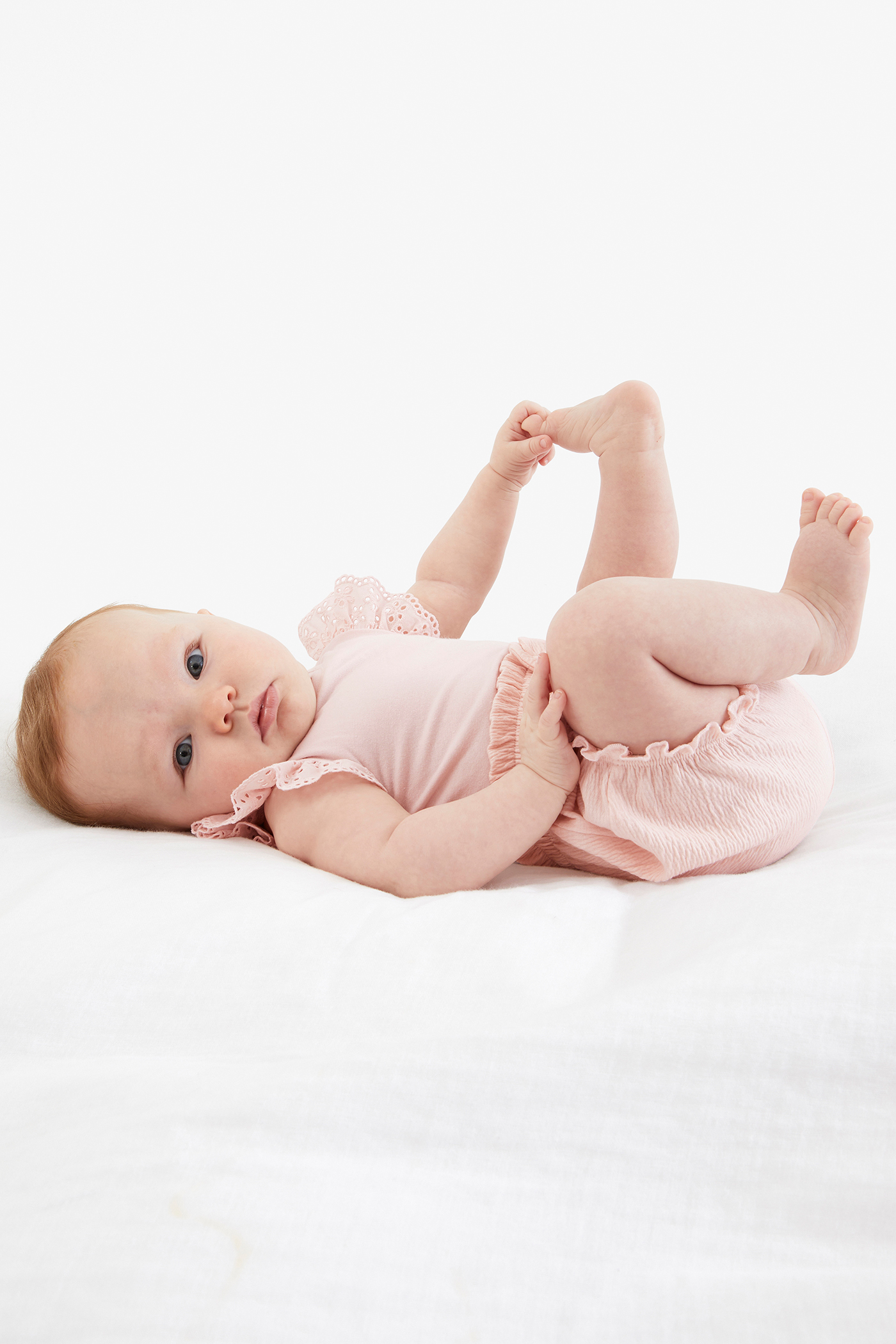 Ärmlös body med volanger | Kappahl