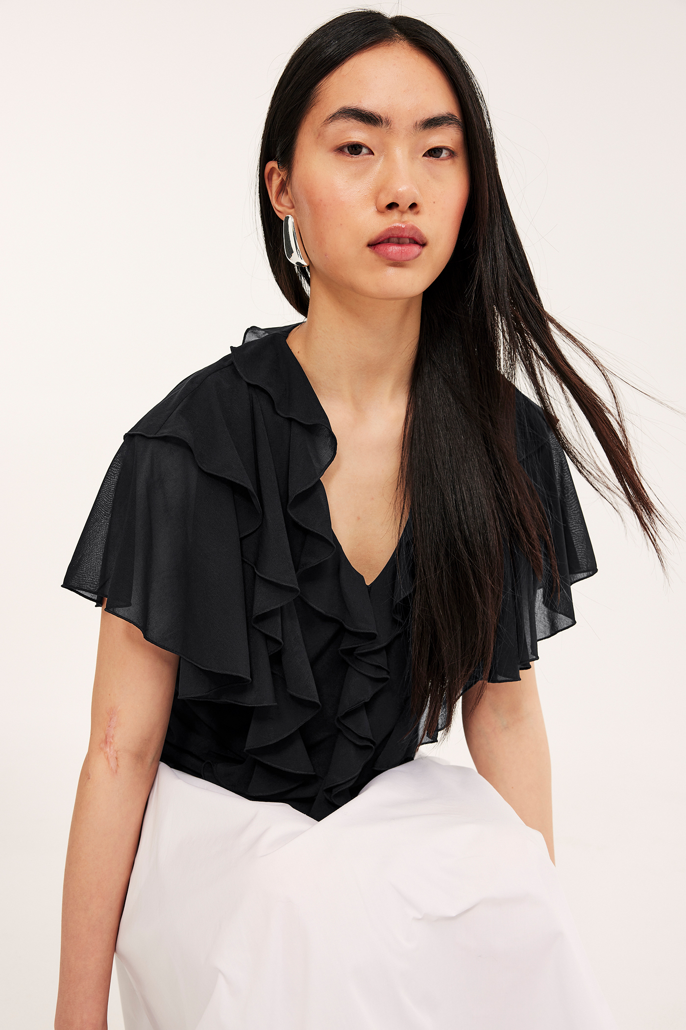 Meshtopp med volanger | Svart | Dam | Kappahl